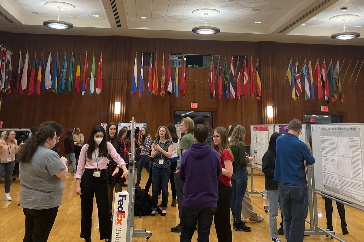 Image: a research poster display during CUWiP