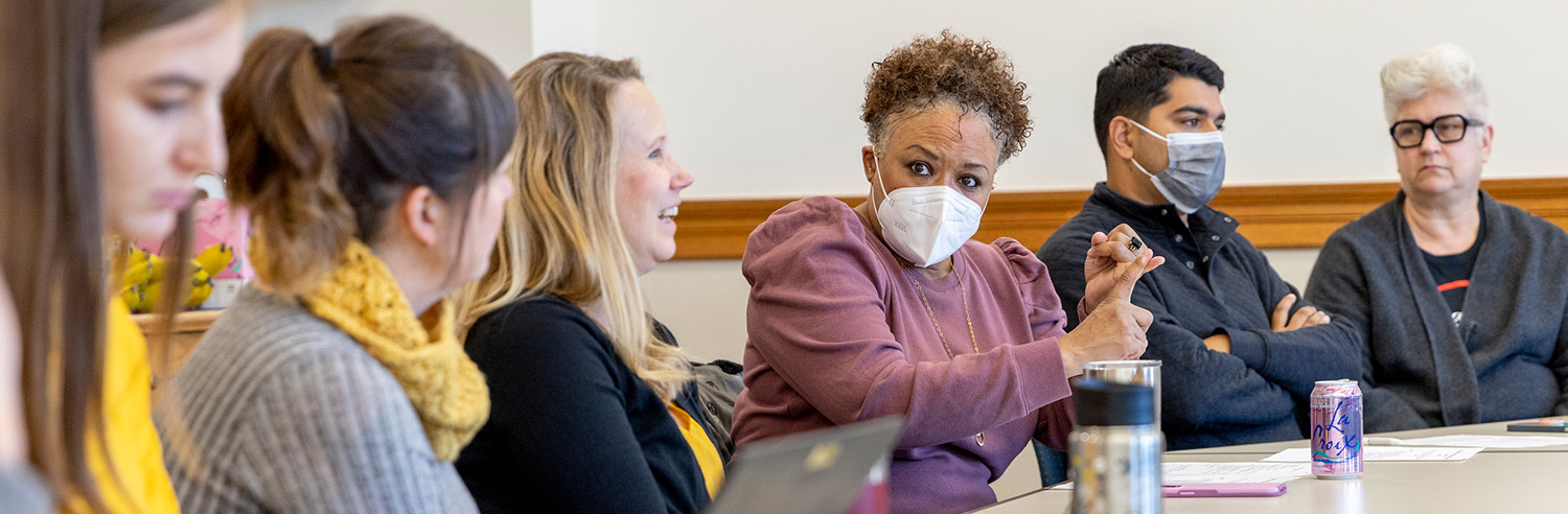 CLAS DEI committee members engage during a roundtable discussion.