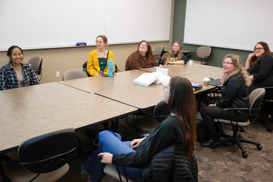 Center for Teaching staff Anna Flaming and Anastasia Williams work with ...